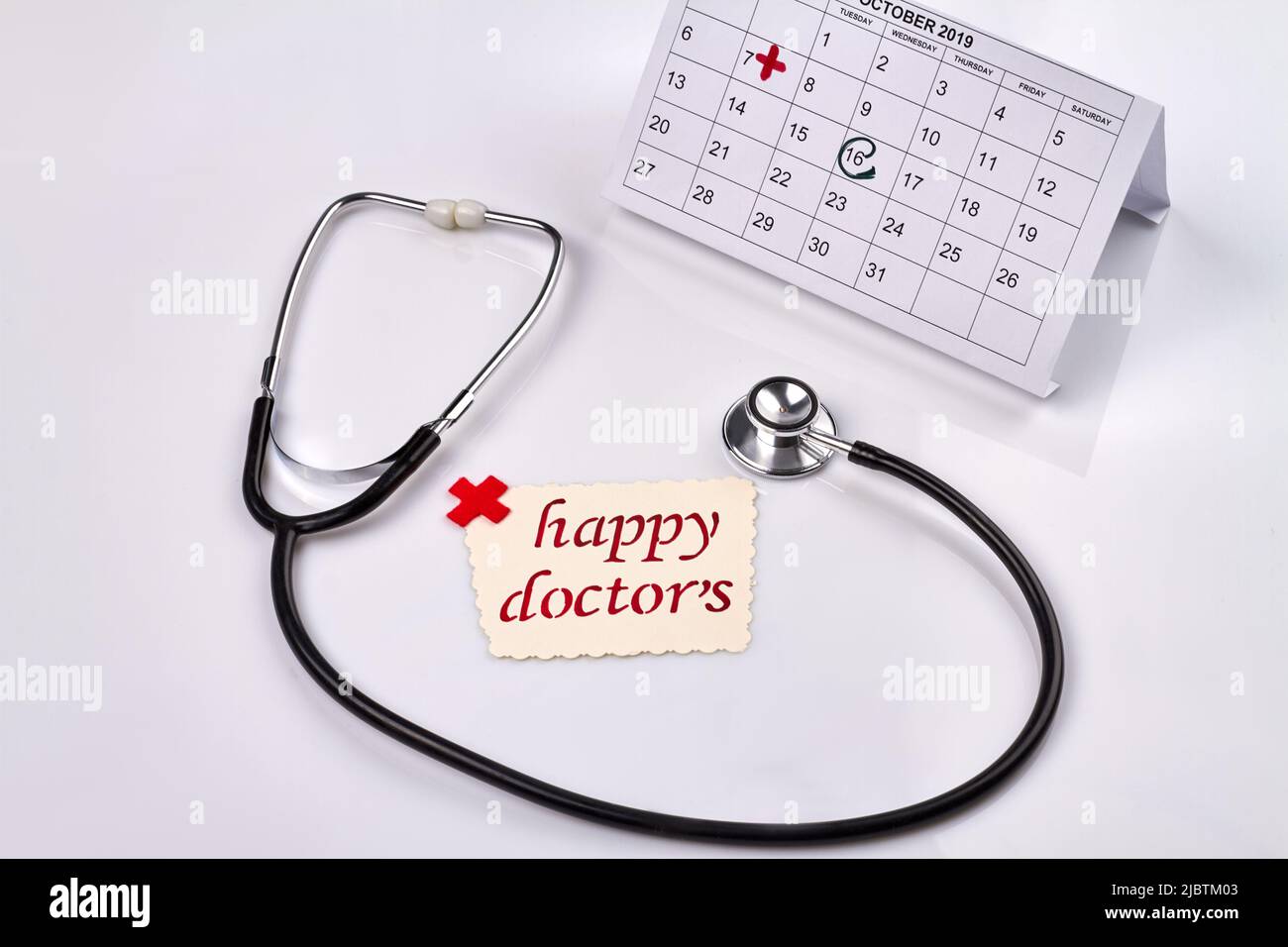 Happy doctors day concept. Stethoscope and october calendar. Isolated ...