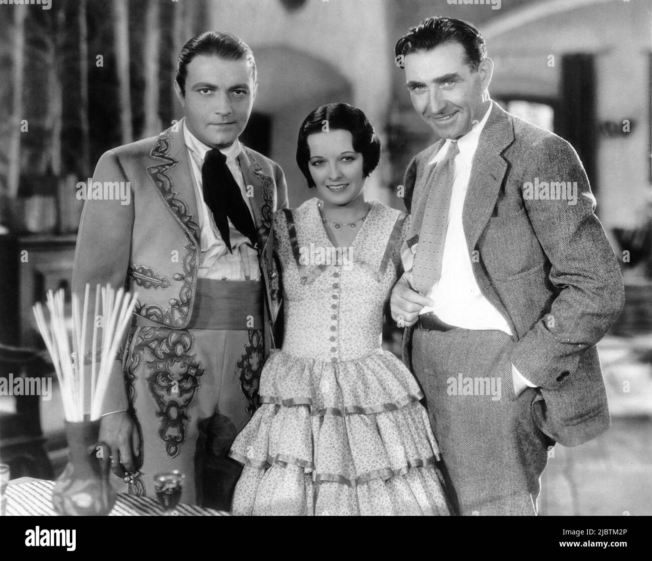 RICHARD BARTHELMESS MARION NIXON and Director FRANK LLOYD on set candid ...