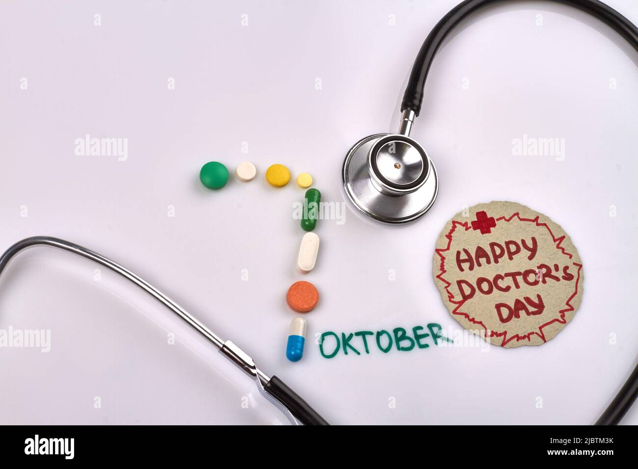Happy doctors day concept top view flat lay. Stethoscope with tablet ...