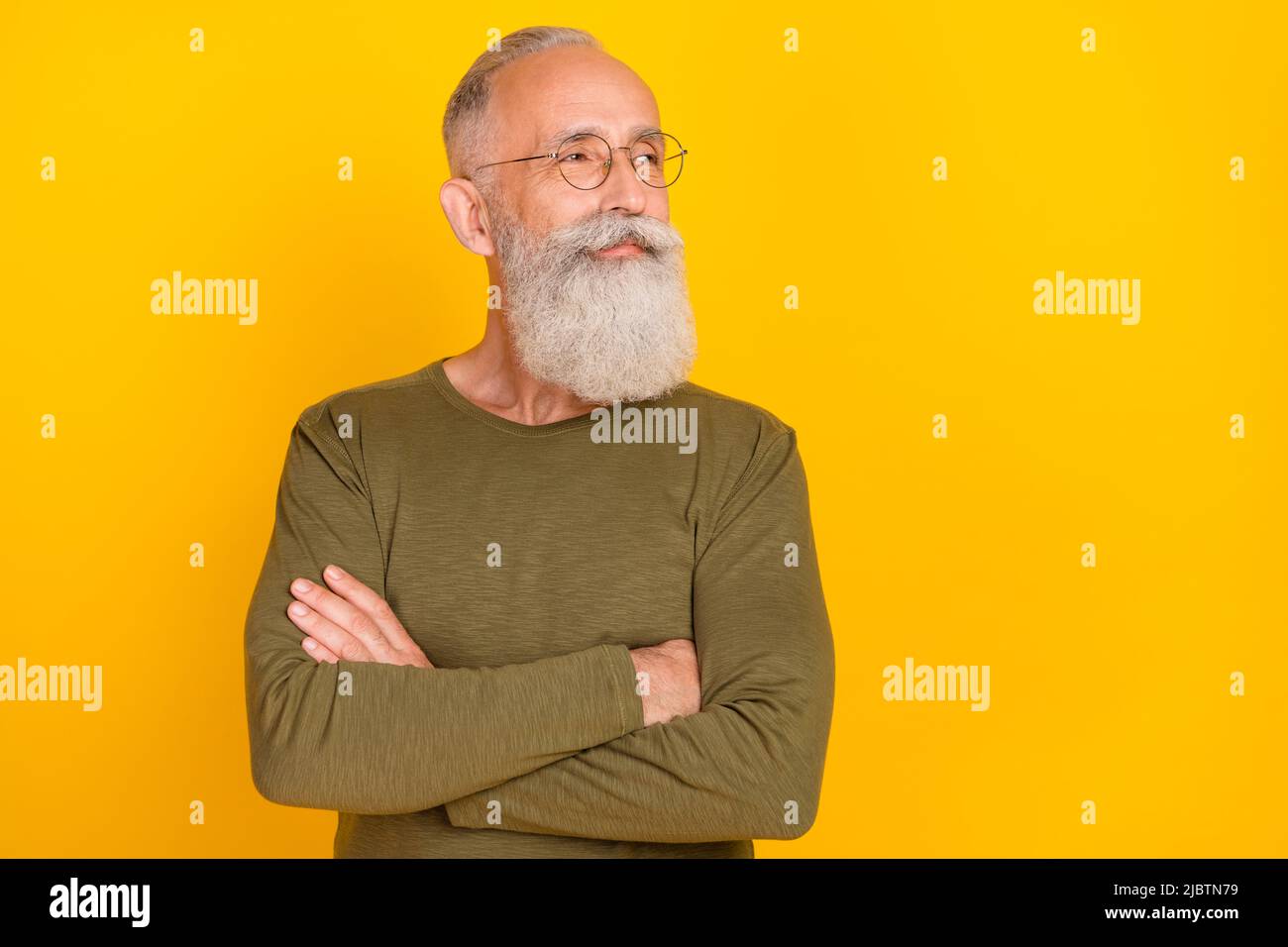 Photo of confident smart old man crossed hand look empty space wear ...