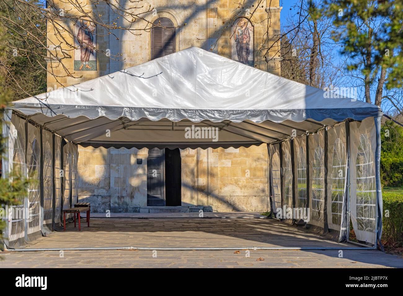 White Canopy Tent Structure in Front of Church Entrance Stock Photo - Alamy