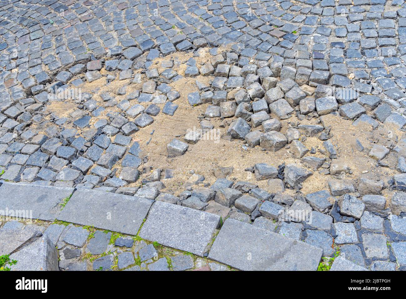 Damaged Cobblestones Street Sinking Hole Filled With Sand Danger Stock ...