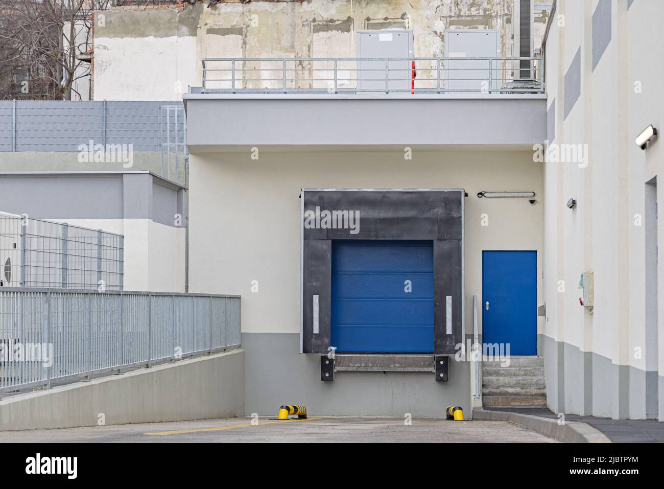 Single Cargo Loading Ramp Warehouse Dock Storage Door Stock Photo - Alamy