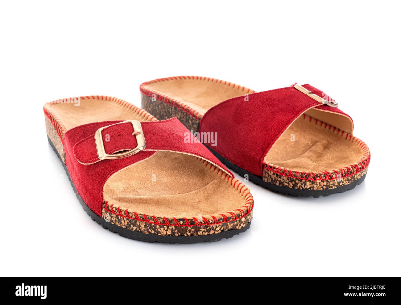 red sandal in front of white background Stock Photo - Alamy