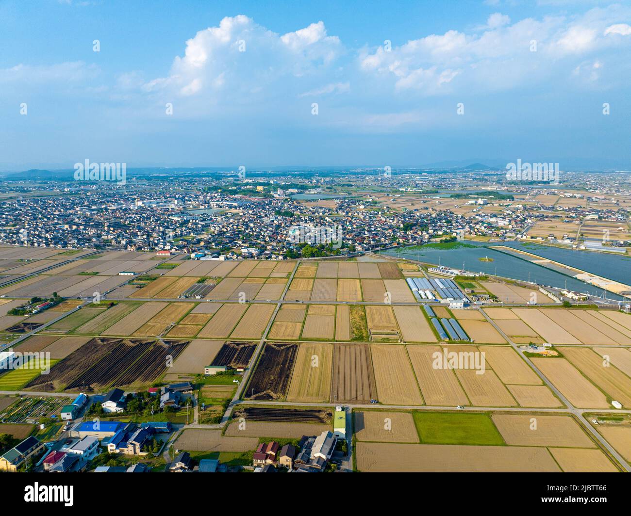 Aerial view of clouds over dry unplanted fields Stock Photo - Alamy