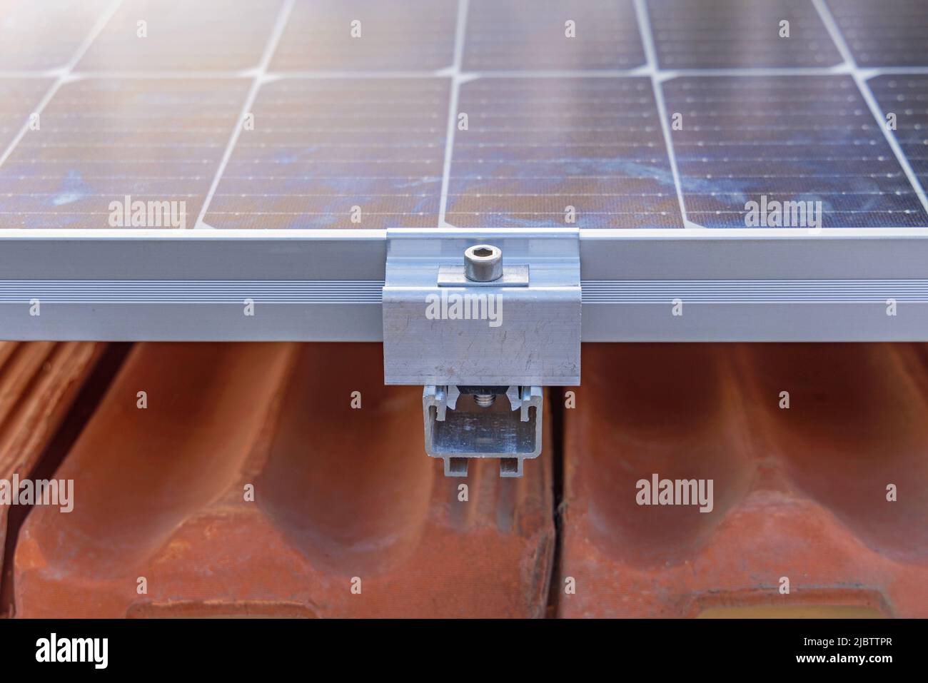Solar Panel Holder Mounting Bracket at Roof Tiles Stock Photo - Alamy