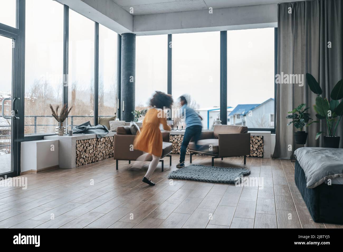 Siblings having fun together and dancing Stock Photo - Alamy