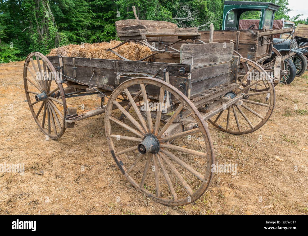 Old vintage authentic wooden wagon intact restored wheels with hay ...