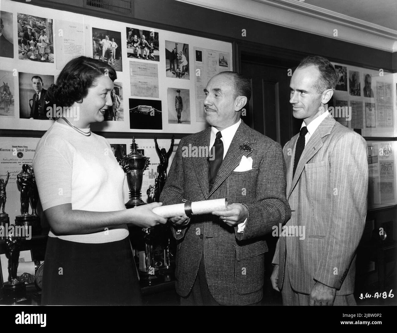 Executive Producer JACK L. WARNER receiving an Award Scroll circa 1949 ...