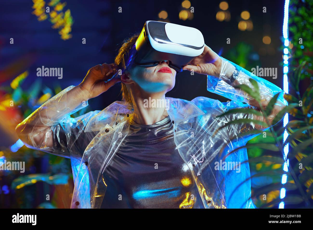 trendy woman in virtual reality in vr goggles Stock Photo - Alamy