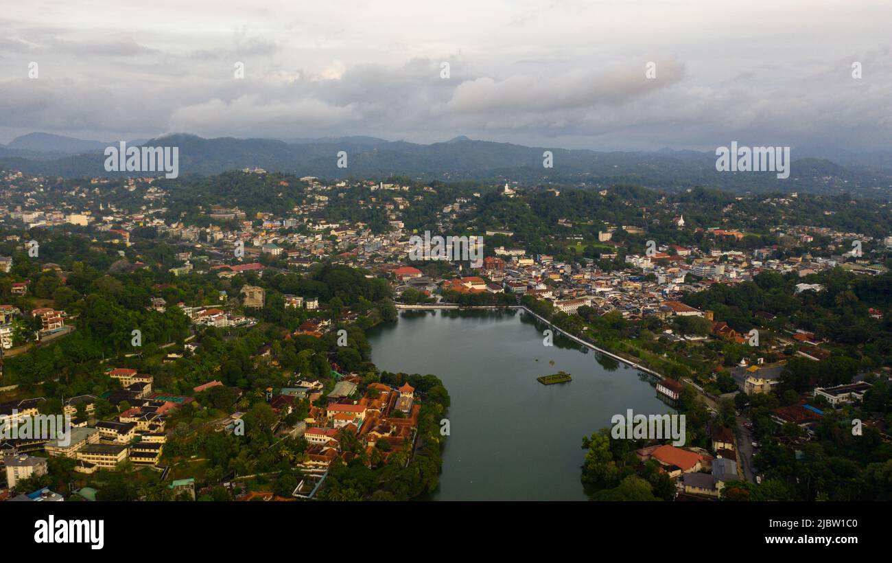 The city of Kandy is surrounded by high mountains covered with jungle ...