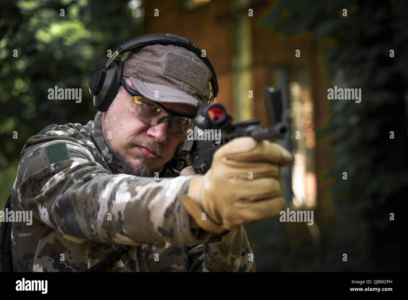 Outdoor shooting range. Police training in shooting gallery with weapon ...