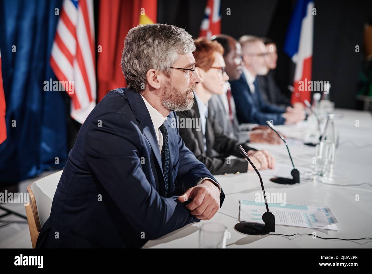 Diverse group of people debate hi-res stock photography and images - Alamy