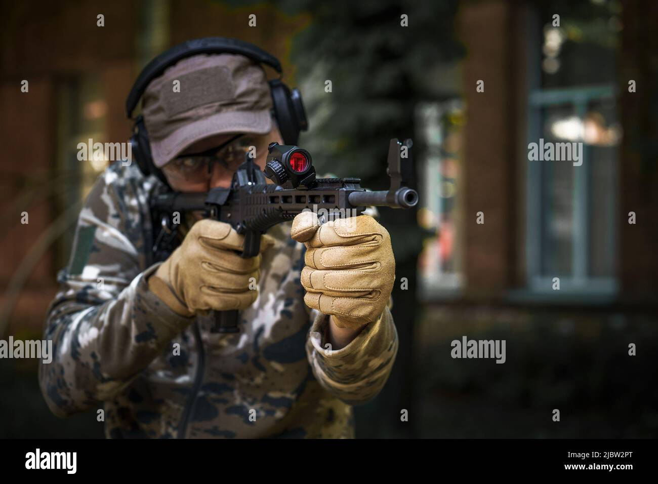 Private military contractor at tactical training course. Shooter with a ...