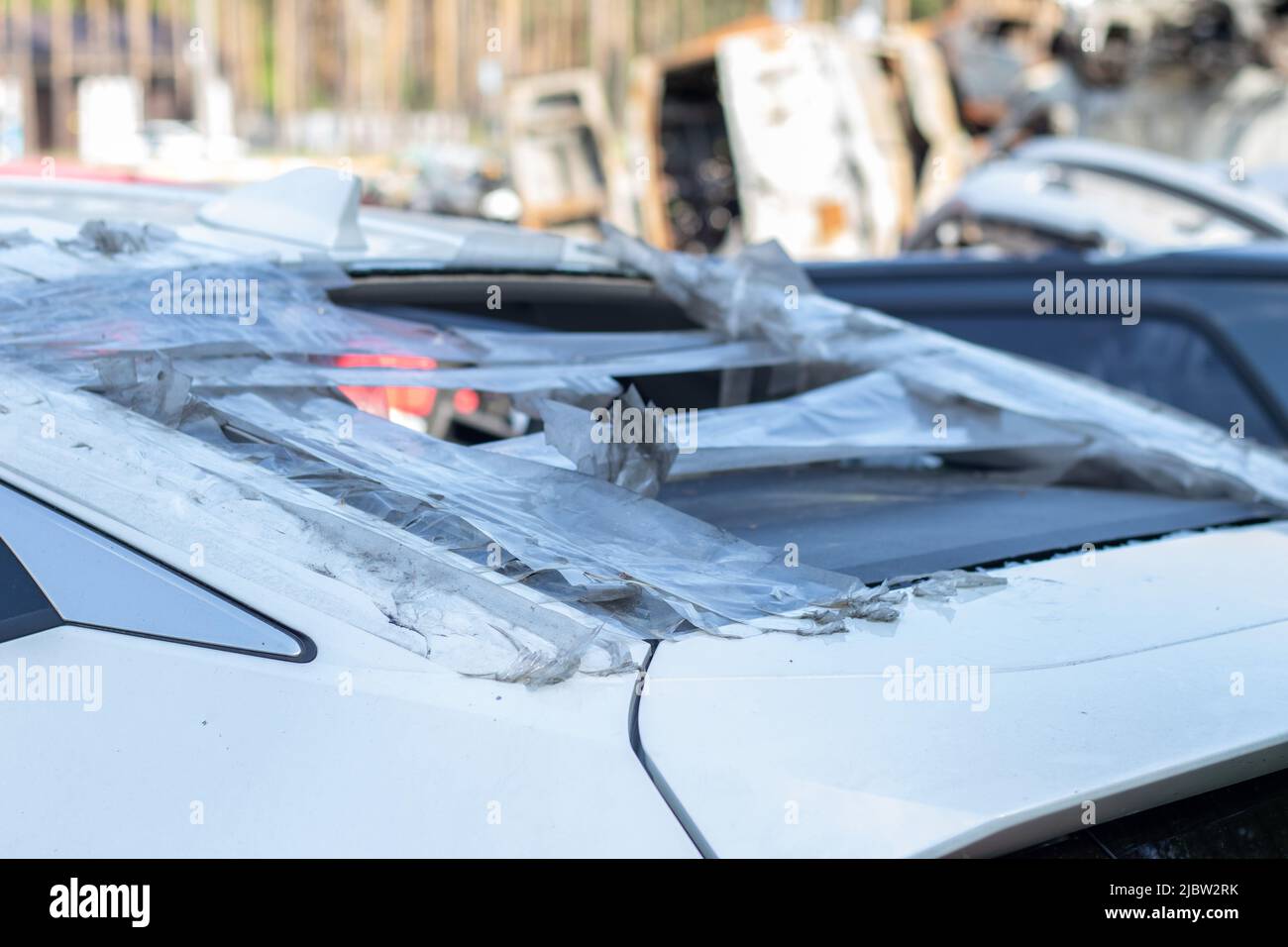 A car after an accident with a broken rear window. Broken window in a ...