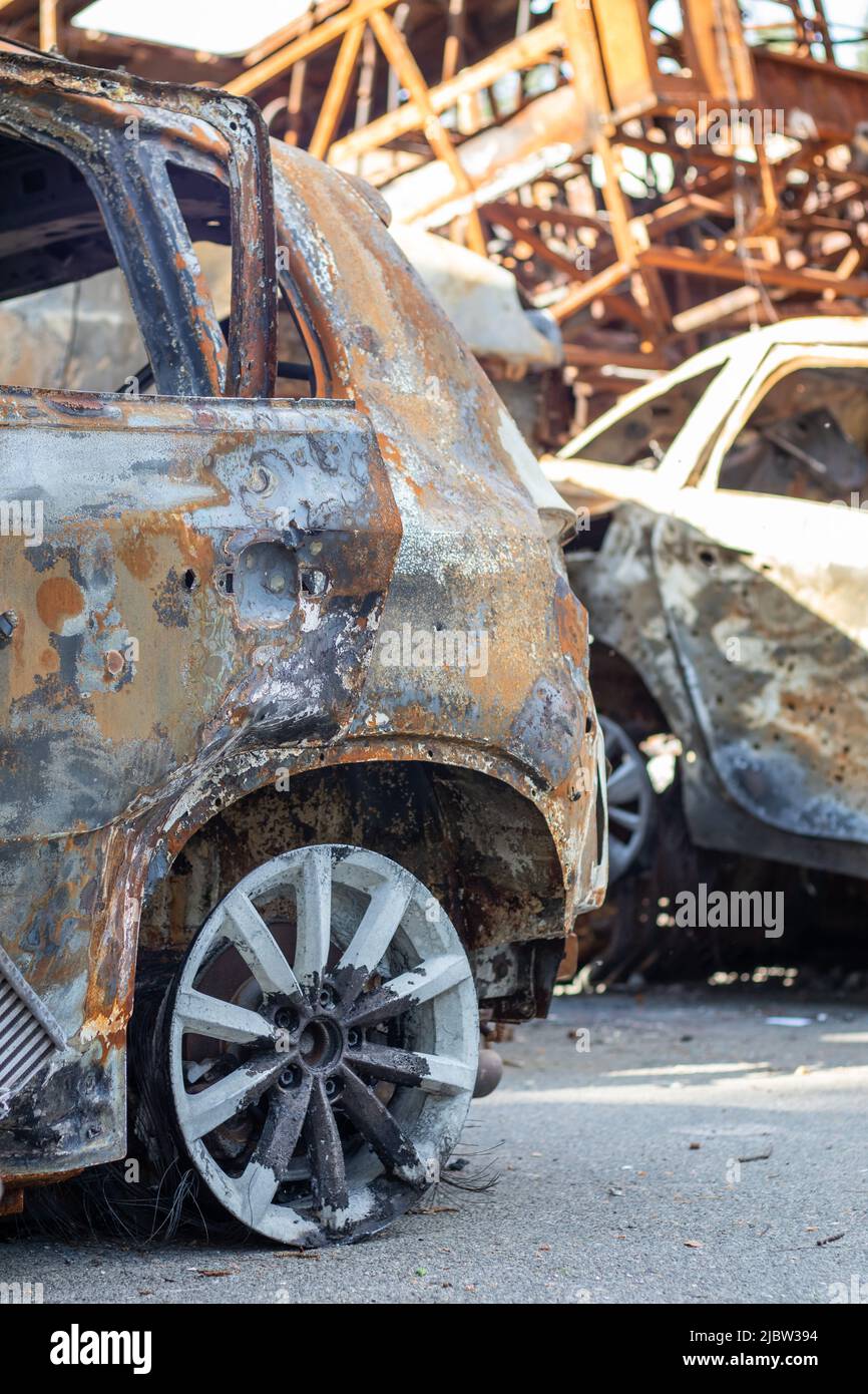 The car burned down completely, even the tires burned out. Burnt out ...