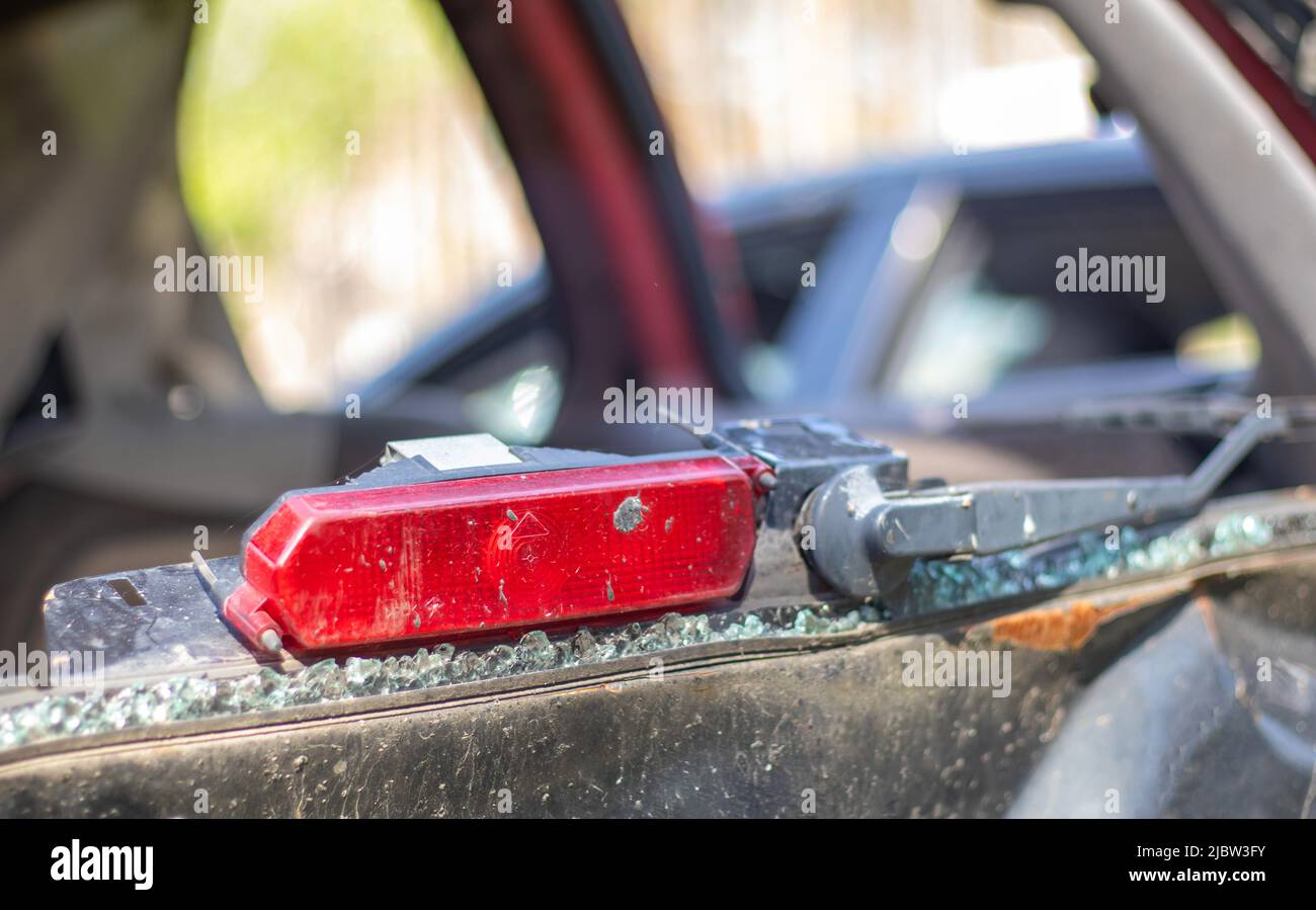 A car after an accident with a broken rear window. Broken window in a ...