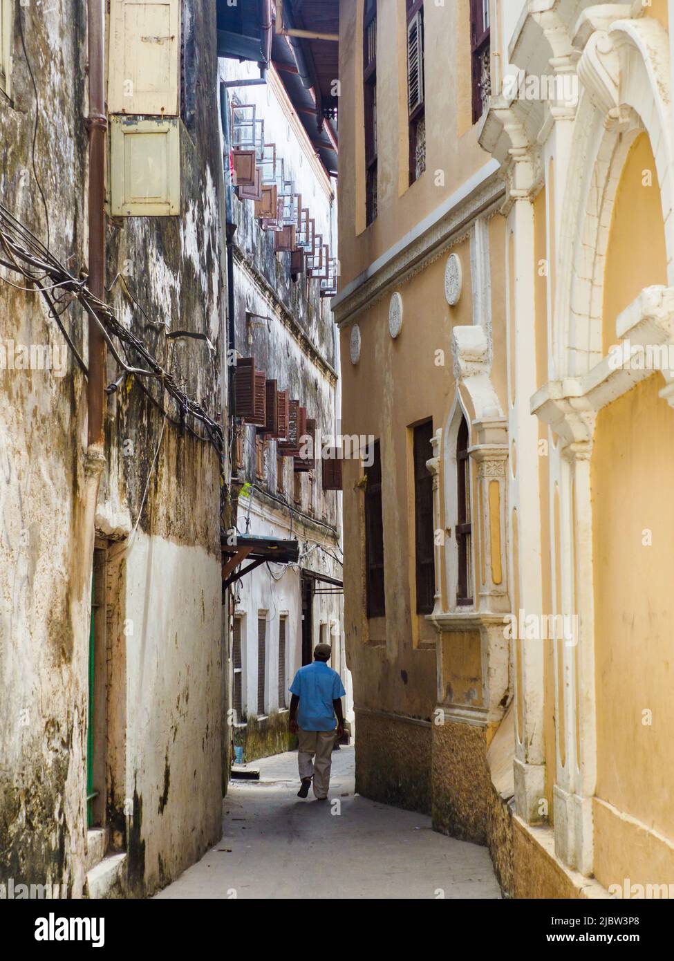 Stone Town, Zanzibar, Tanzania - Jan 2021:, People on the narrow street ...