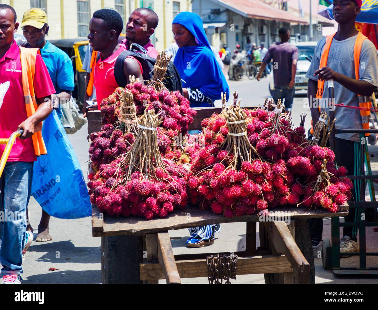 Zanzibar, Tanzania - February 2021: Lots of red lychees sold directly ...