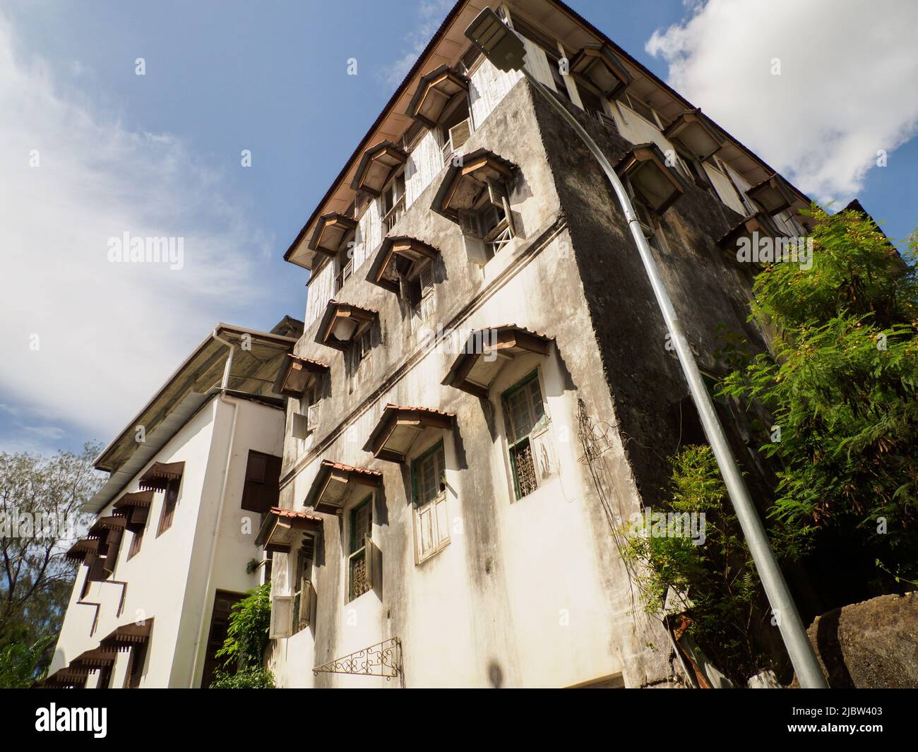 Stone Town, Zanzibar - Feb. 2021: View up tp the sky between narrow ...