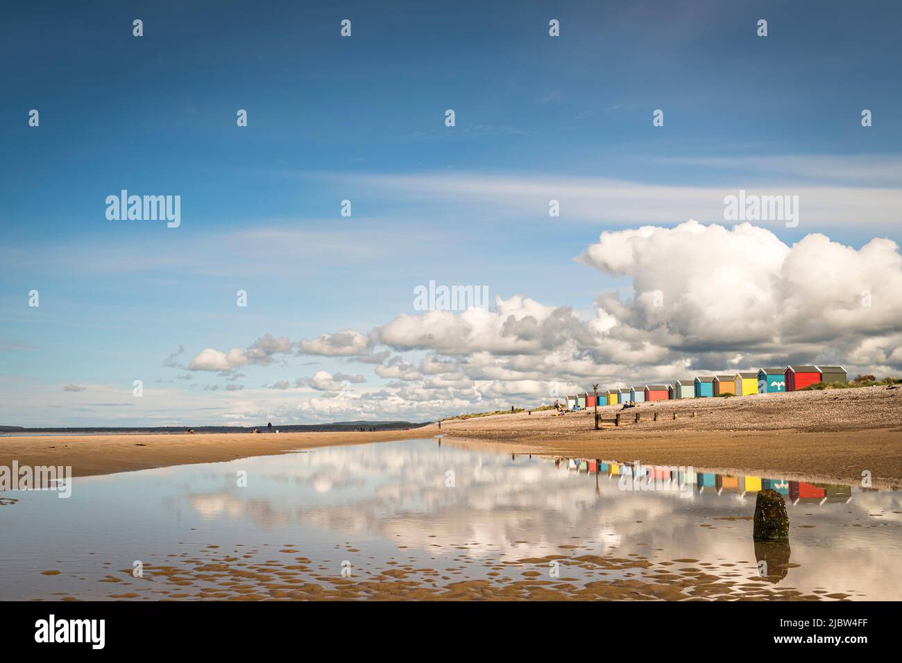 A sunny, summer seascape HDR image of Findhorn beach and the Beach Huts ...