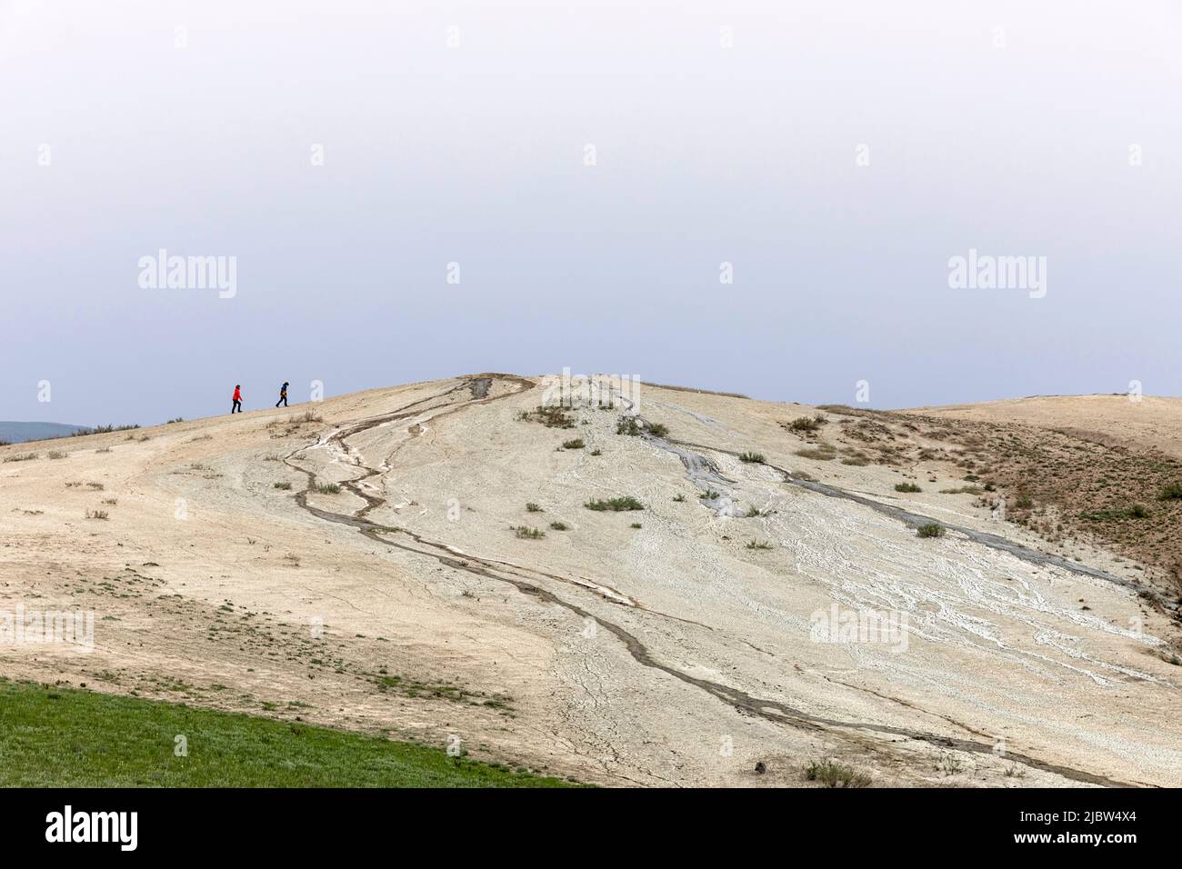 Mother and son walking at Takhti-Tepha Mud Volcanoes in Chachuna ...
