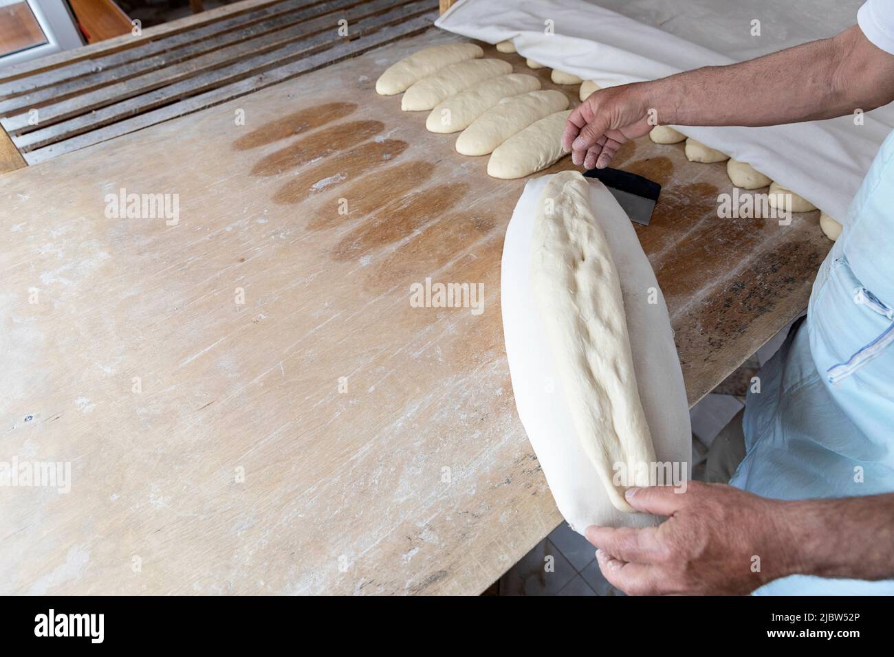 A baker making georgian lavash bread hi-res stock photography and ...
