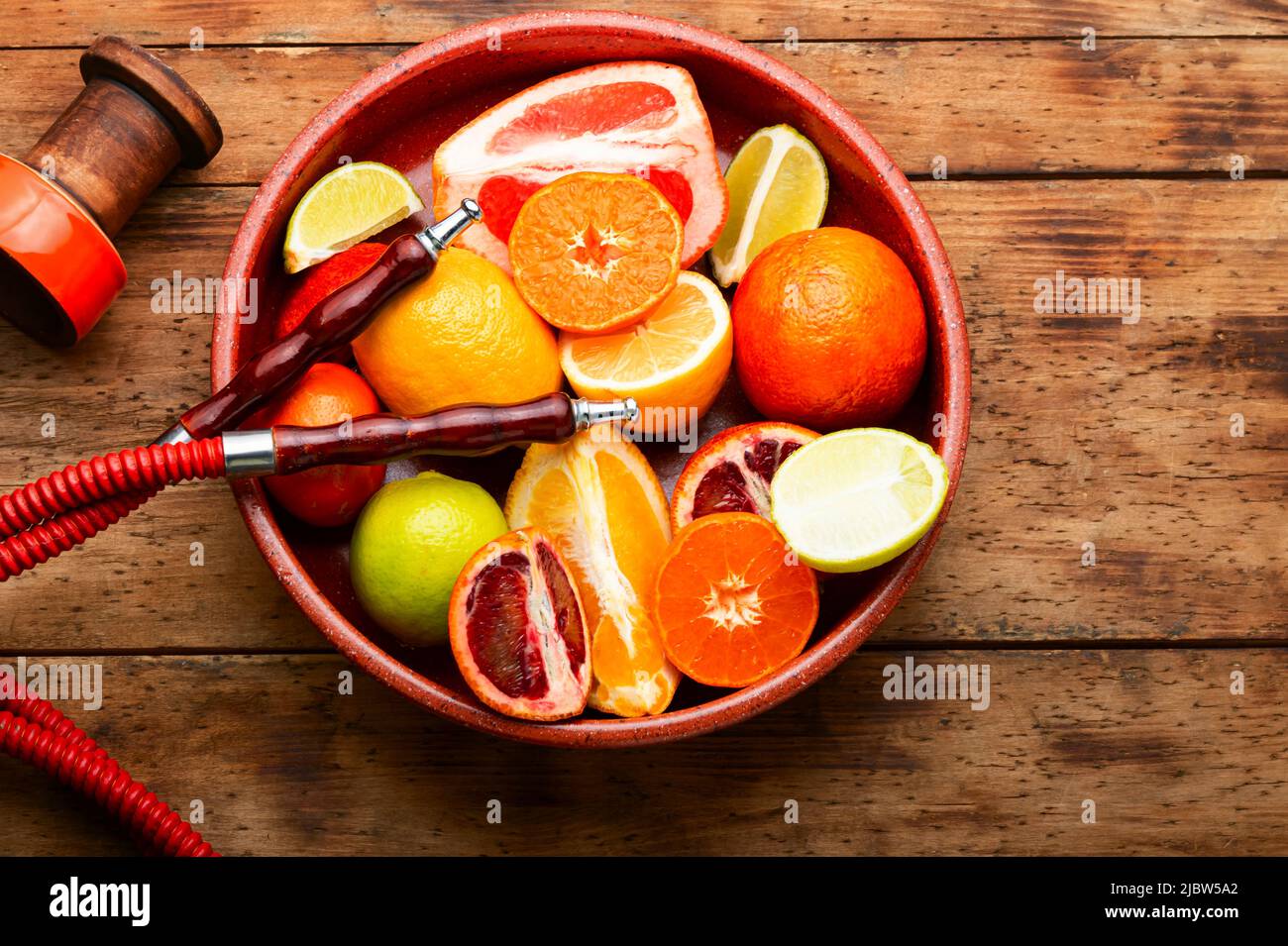 East smoking kalian or shisha with tobacco from citrus fruits Stock ...