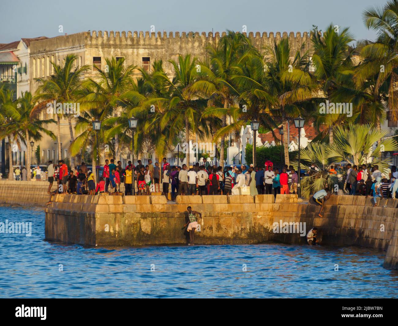 Stone town, Zanzibar, Tanzania - Jan 2021: Crowd of the people on the ...