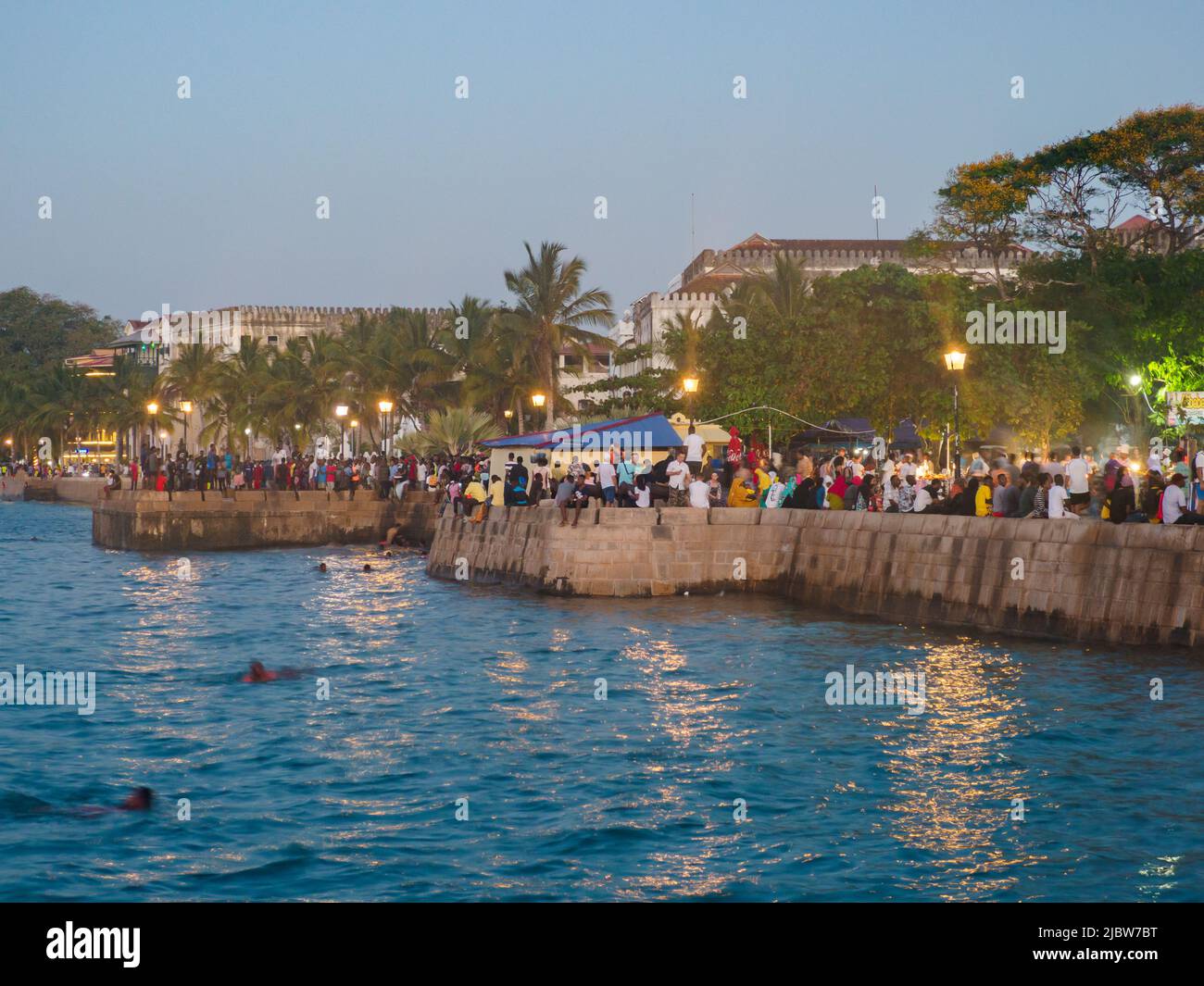 Stone town, Zanzibar, Tanzania - Jan 2021: Crowd of the people on the ...