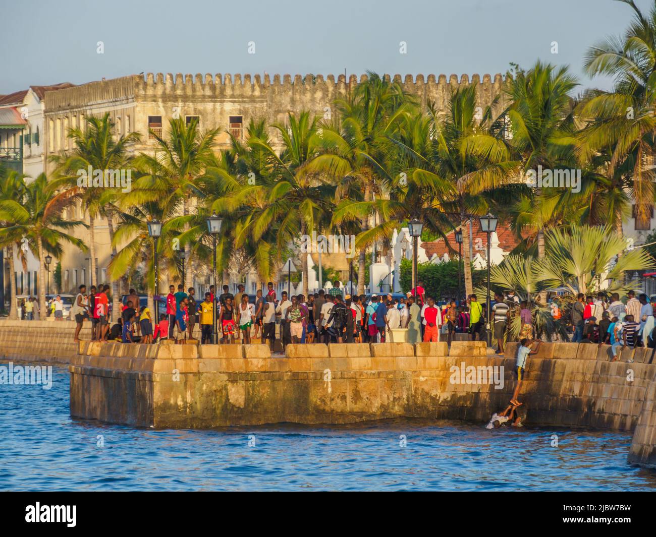 Stone town, Zanzibar, Tanzania - Jan 2021: Crowd of the people on the ...