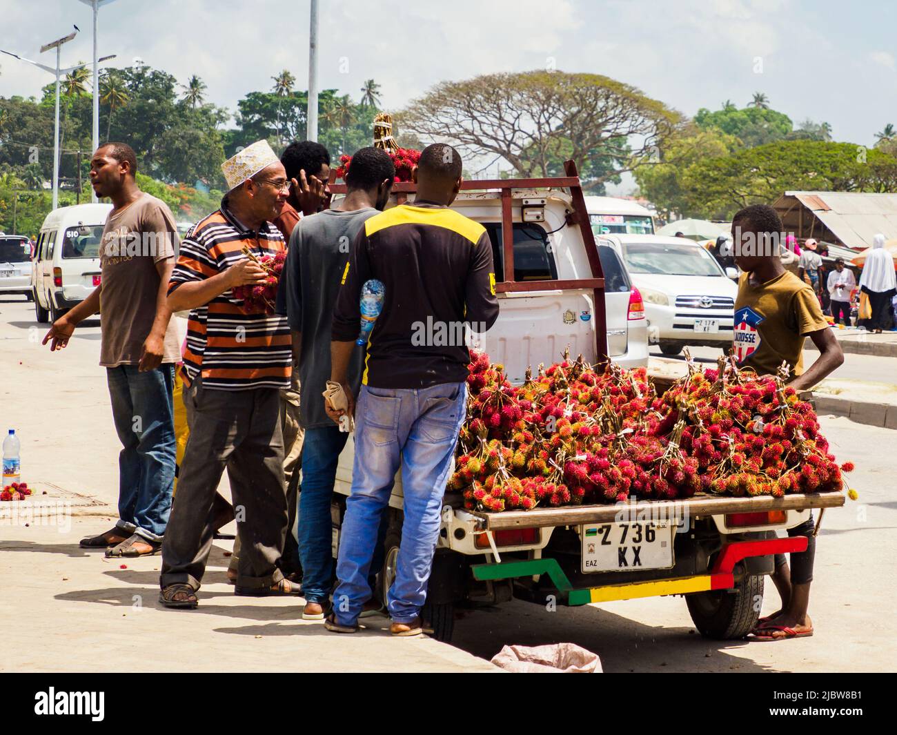 Zanzibar, Tanzania - Feb, 2021: Plenty of cluster of red lychee fruits ... Zanzibar, Tanzania - Feb, 2021: Plenty of cluster of red lychee fruits ...
