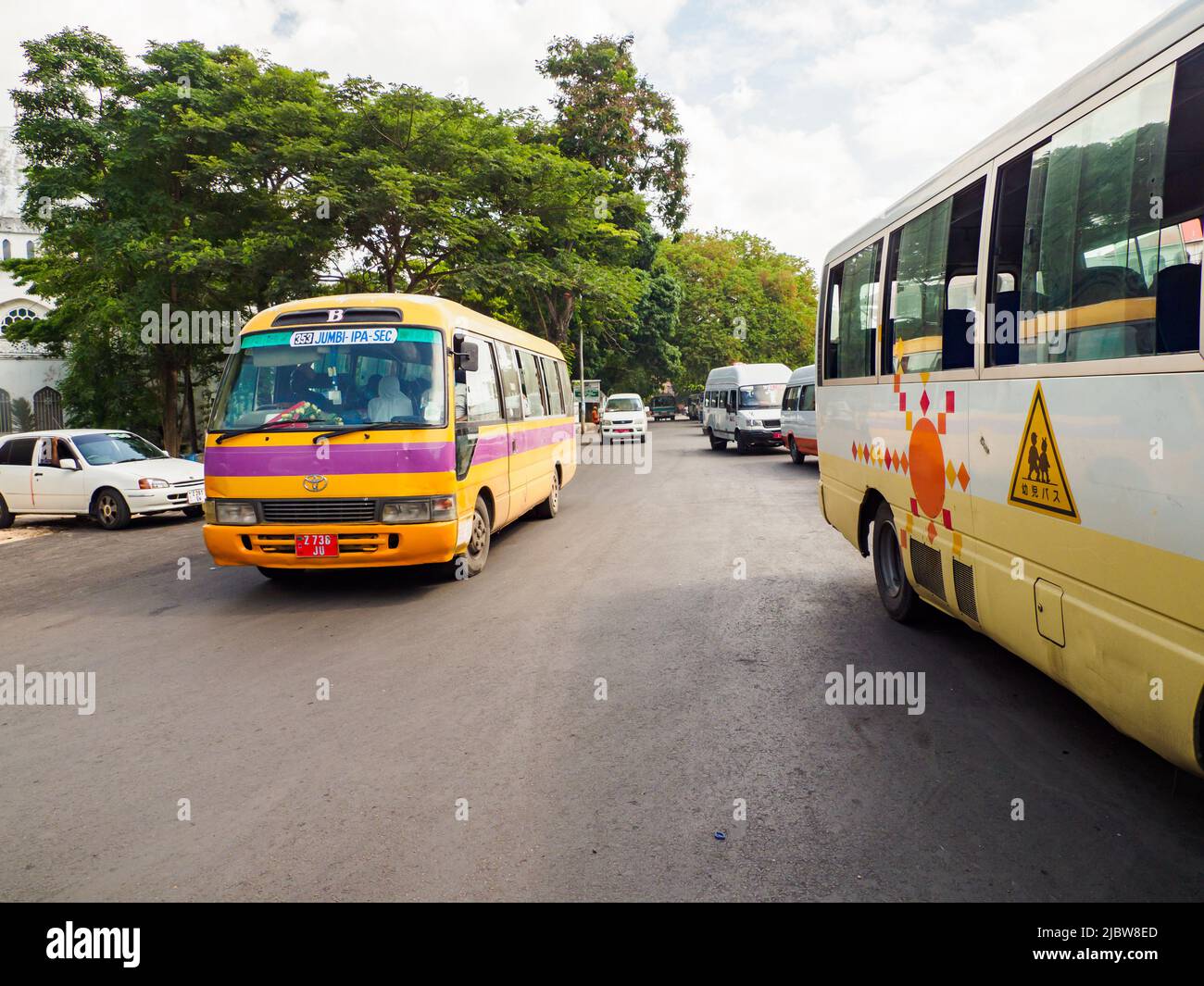 Zanzibar, Tanzania - January 2021: Buses on the street of Africa ...