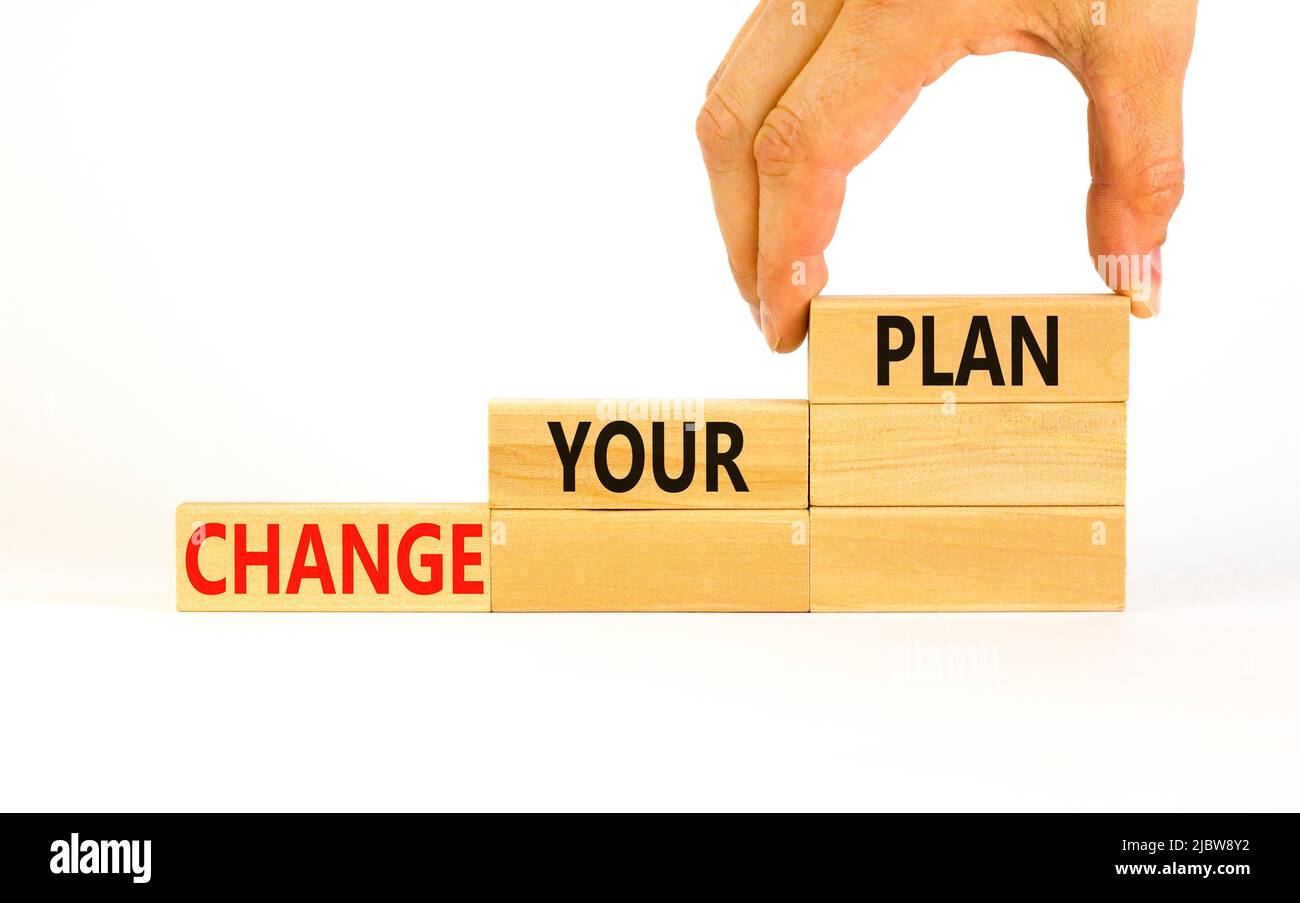 Change your plan symbol. Concept words Change your plan on wooden blocks on a beautiful white ...