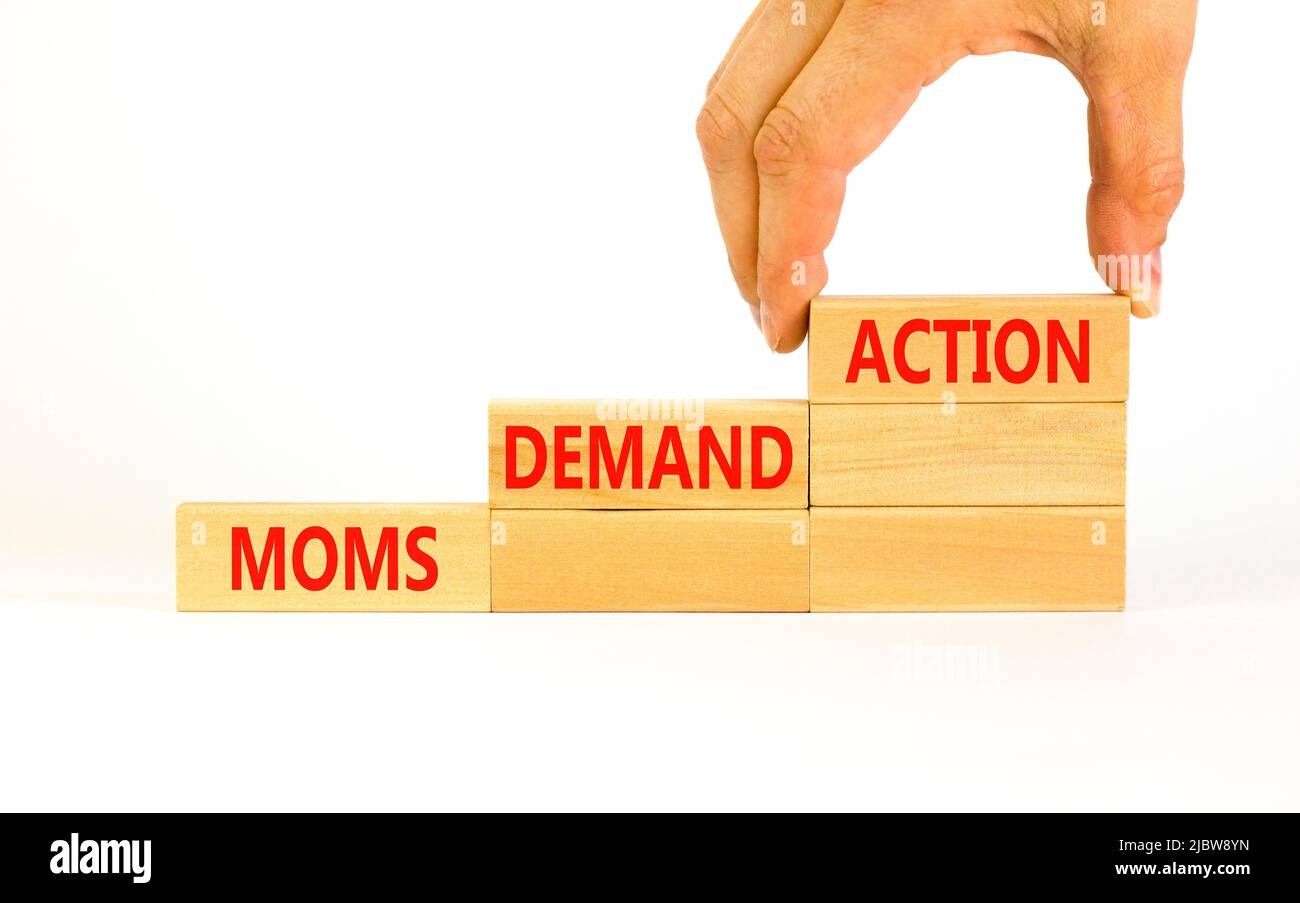 Moms demand action symbol. Concept words Moms demand action on wooden ...