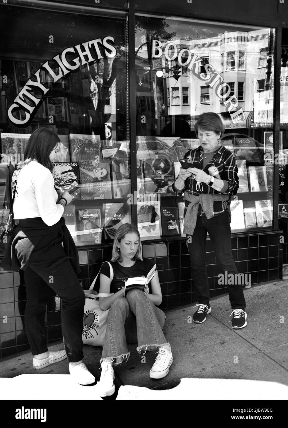 A family visiting San Francisco, California, stand outside the landmark ...