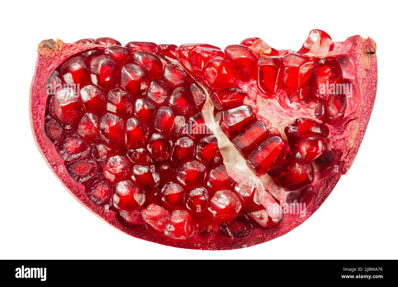 pomegranate slice with red seeds isolated on a white background with ...