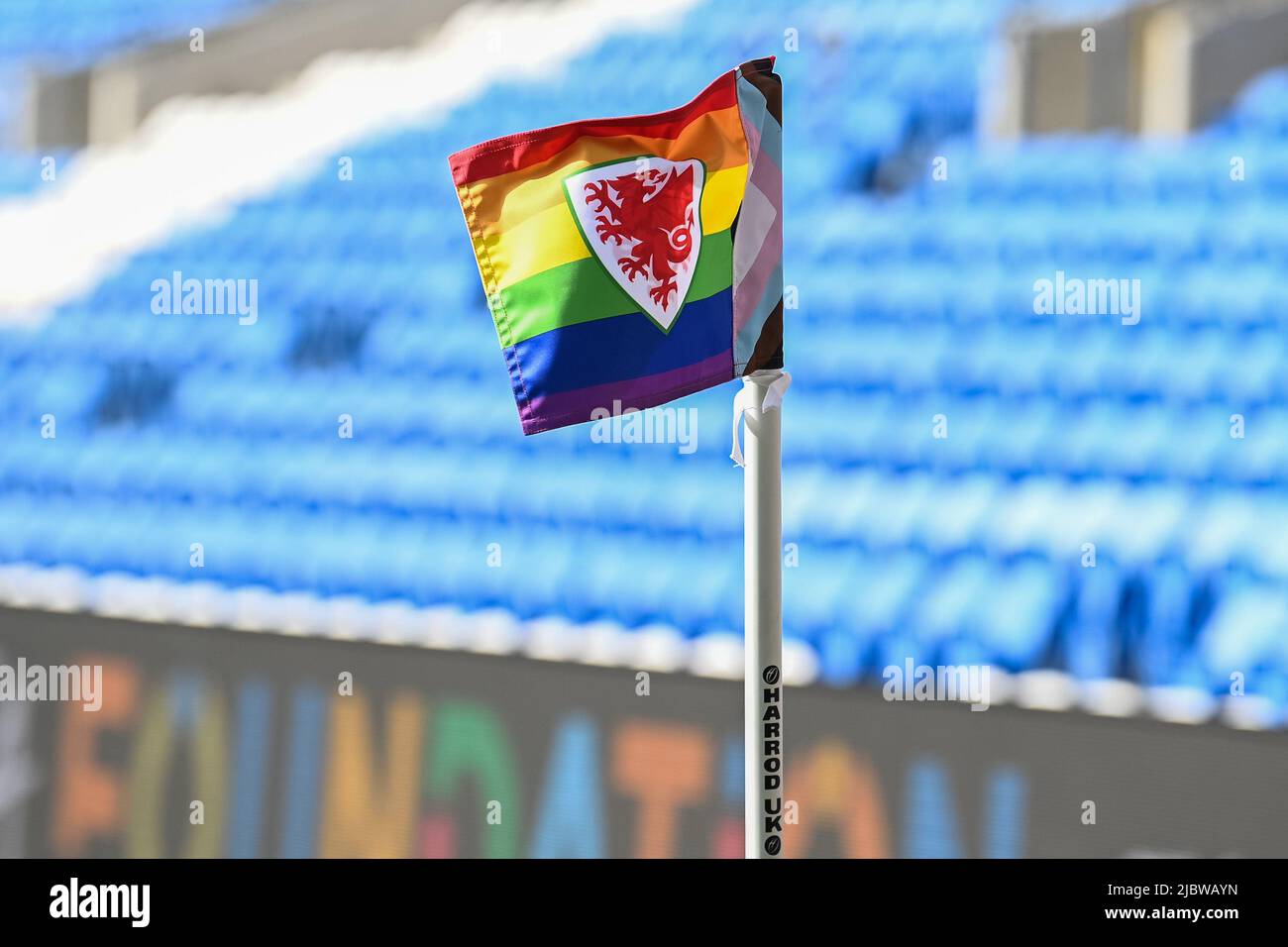 A corner flag at Cardiff City Stadium with the LGBT rainbow stripes ...