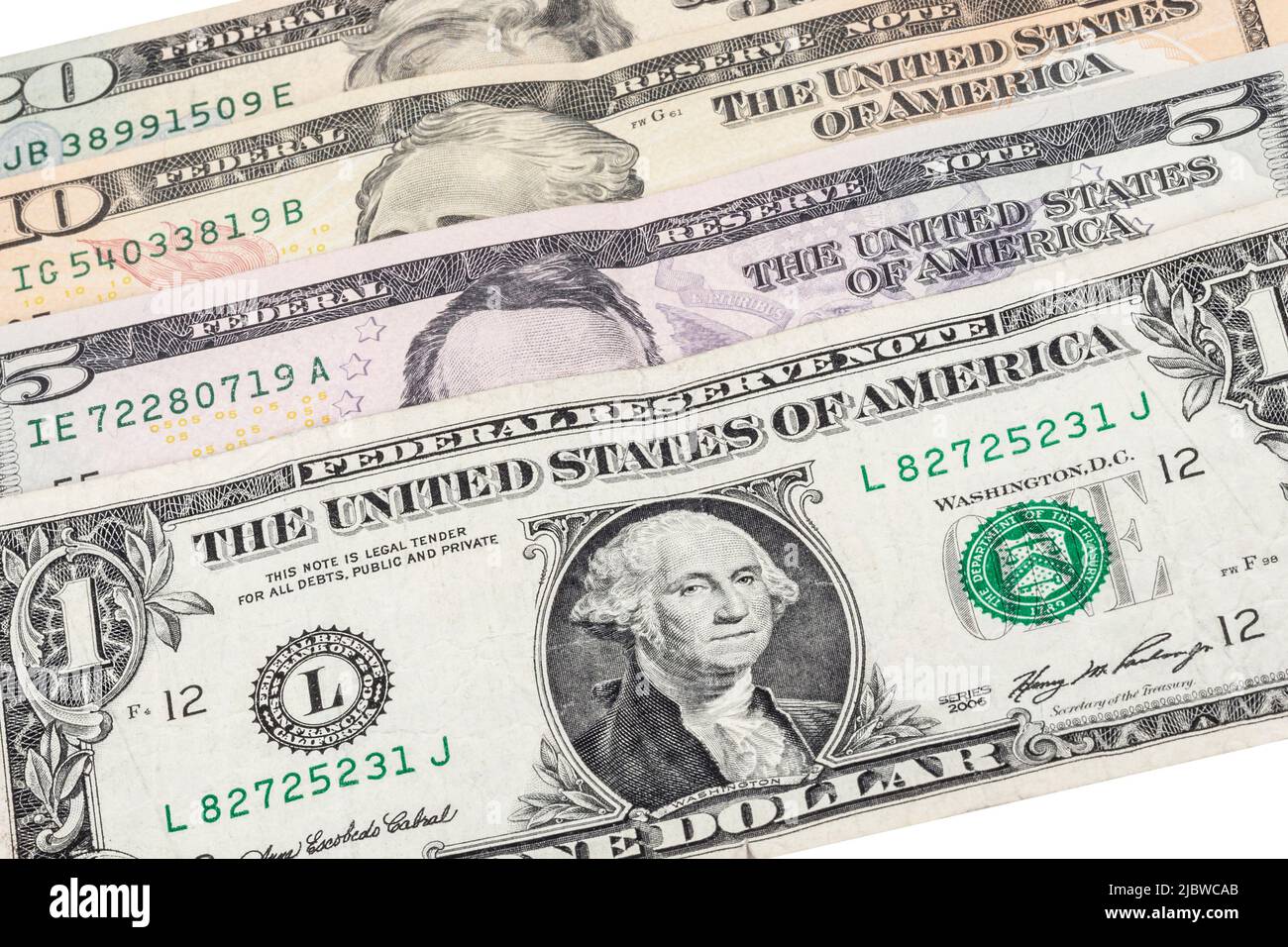 Some American dollars isolated over white Stock Photo - Alamy
