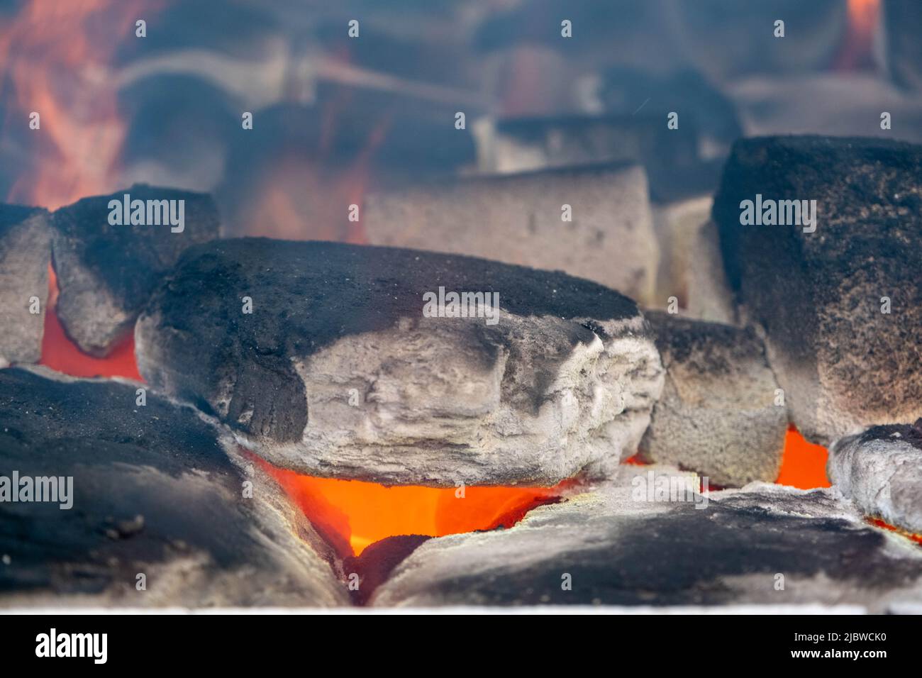 Firing of wood fire kiln is part of process for black pottery. Unique ...
