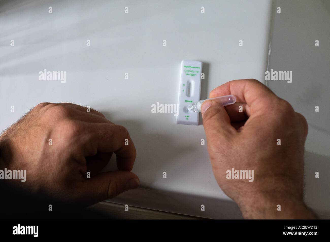 Positive Covid-19 Antigen Test, home test Stock Photo - Alamy