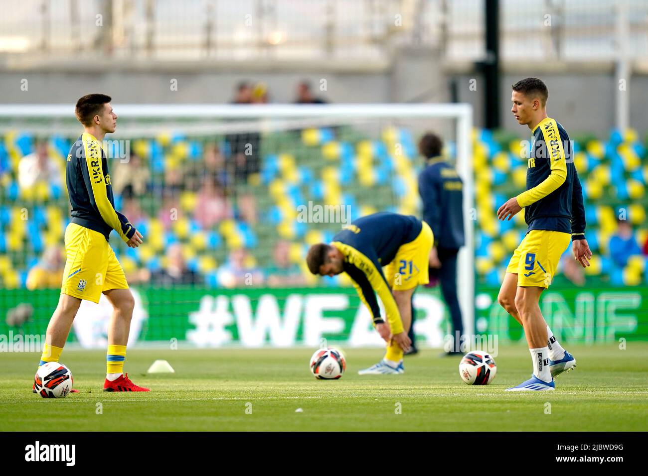 Ukraine's Danylo Sikan, (right) during the warm up during the UEFA ...