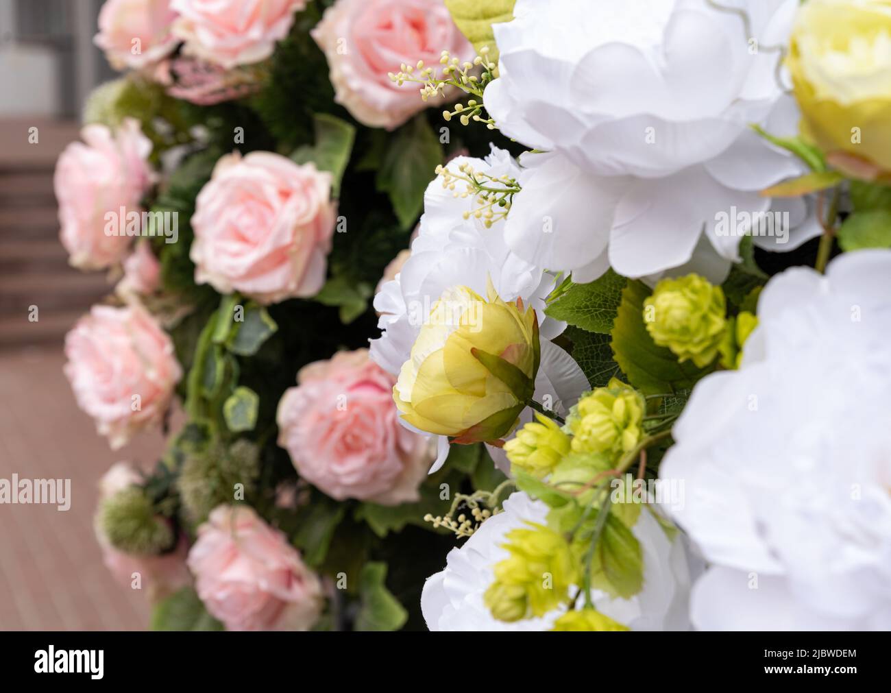 Artificial flowers in pastel colors. A bunch of artificial flowers ...