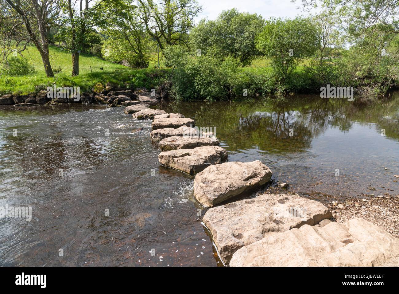 Stepping across rocks hi-res stock photography and images - Alamy
