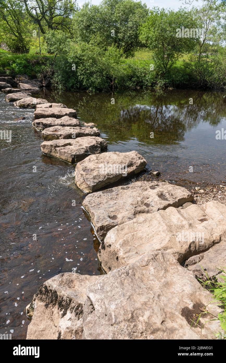 Stepping across rocks hi-res stock photography and images - Alamy