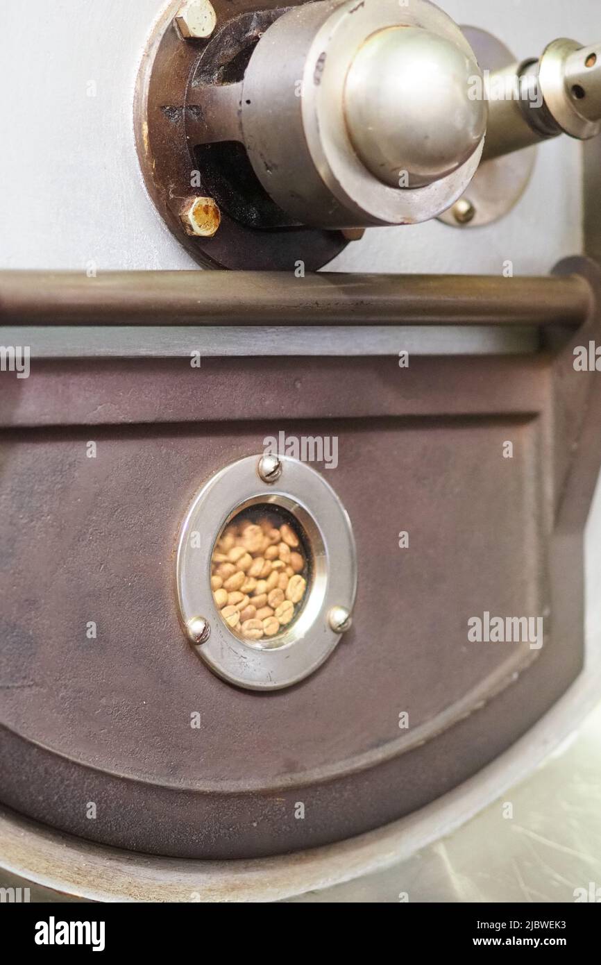 vintage old coffee roaster cooking coffee beans Stock Photo - Alamy