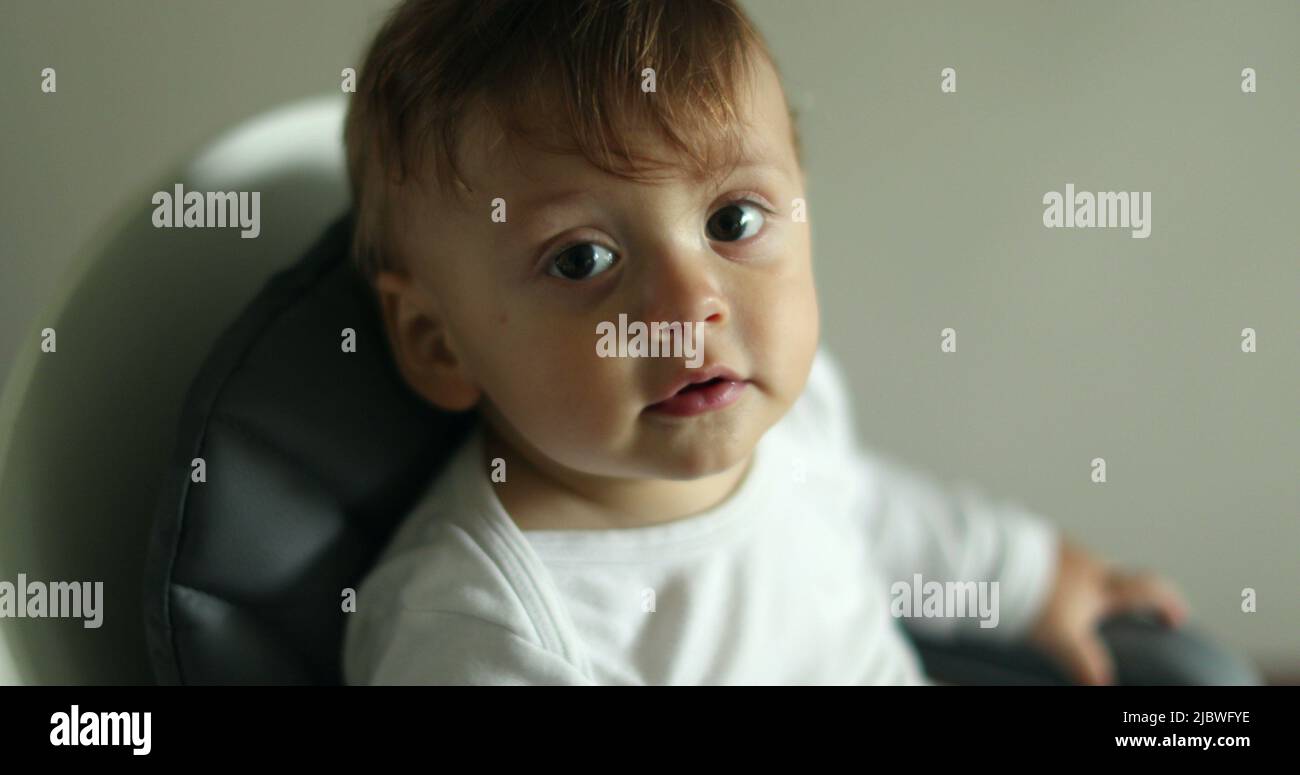 Adorable cute baby pointing to camera smiling. Portrait of infant boy ...