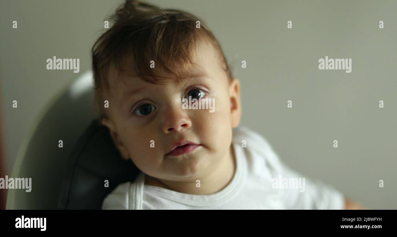 Adorable cute baby pointing to camera smiling. Portrait of infant boy ...