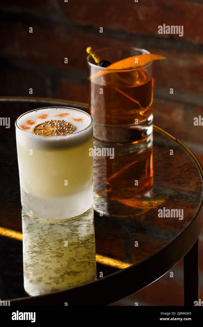 Pisco sour cocktail - whiskey with lime, egg white, sugar syrup in ...