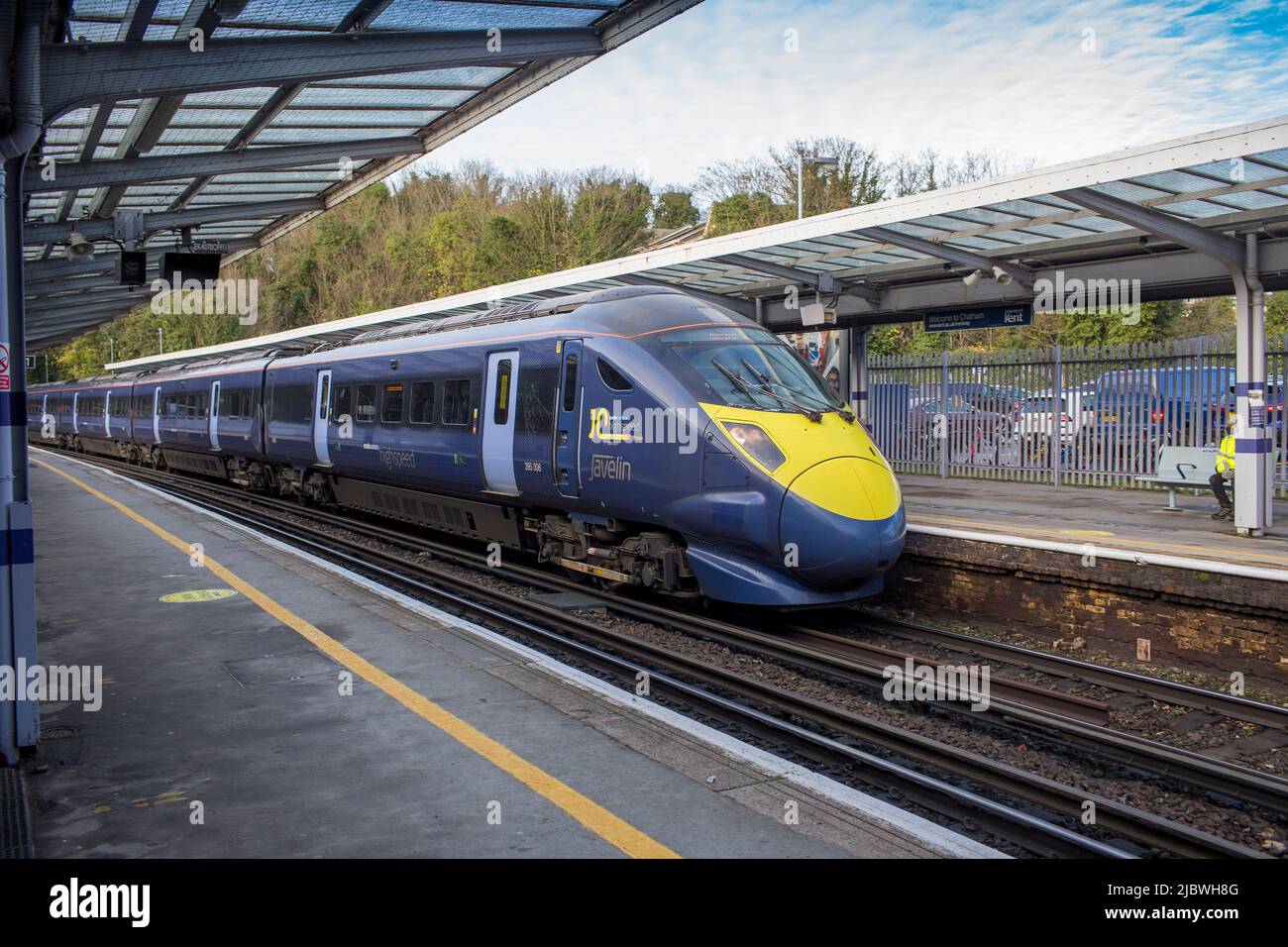 Passengers and trains at the platforms at Chatham railway station ...